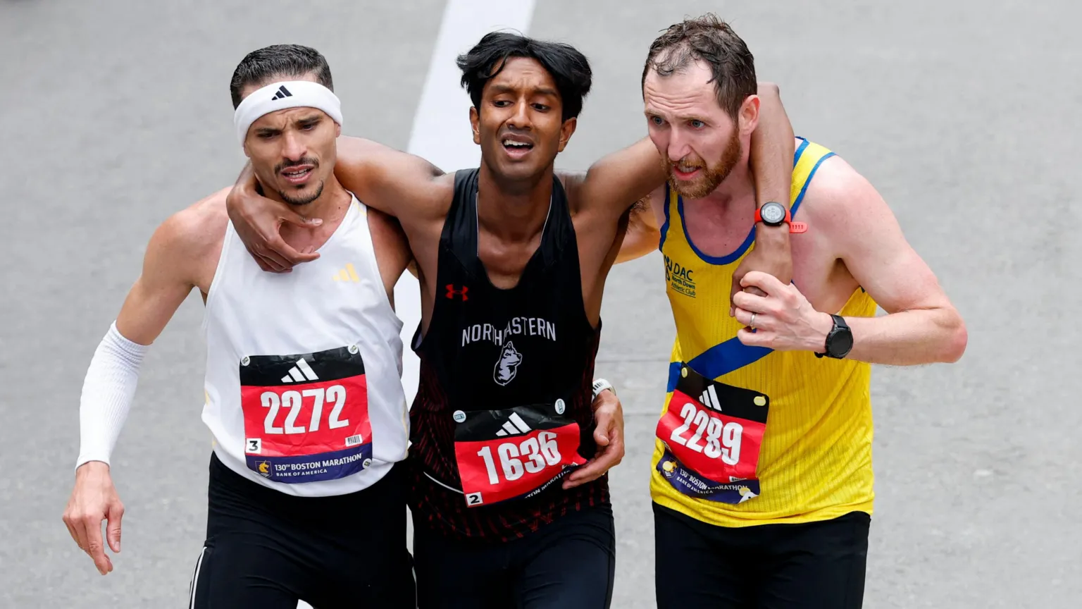 Runners Commended for Assisting Exhausted Athlete to Finish Boston ...